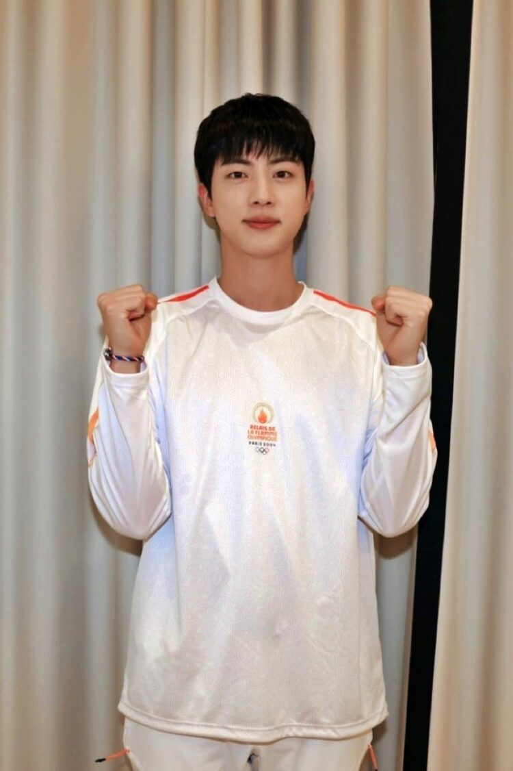BTS Jin Lights Up Paris 2024 Olympic Games Torch Relay as a Dazzling Torchbearer - KPOPPOST