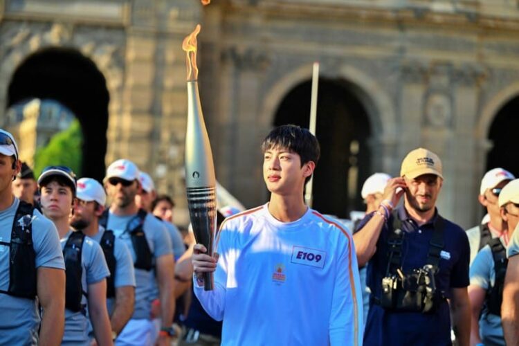 BTS Jin Lights Up Paris 2024 Olympic Games Torch Relay as a Dazzling ...
